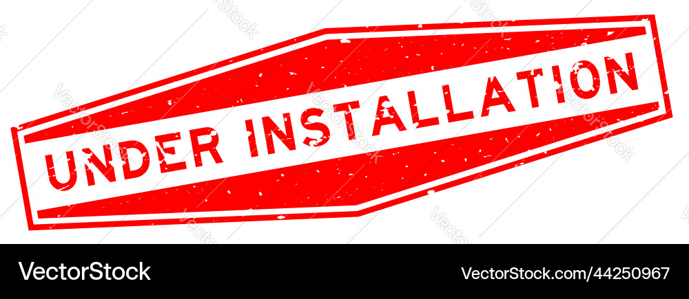 Grunge red under installation word hexagon rubber Vector Image