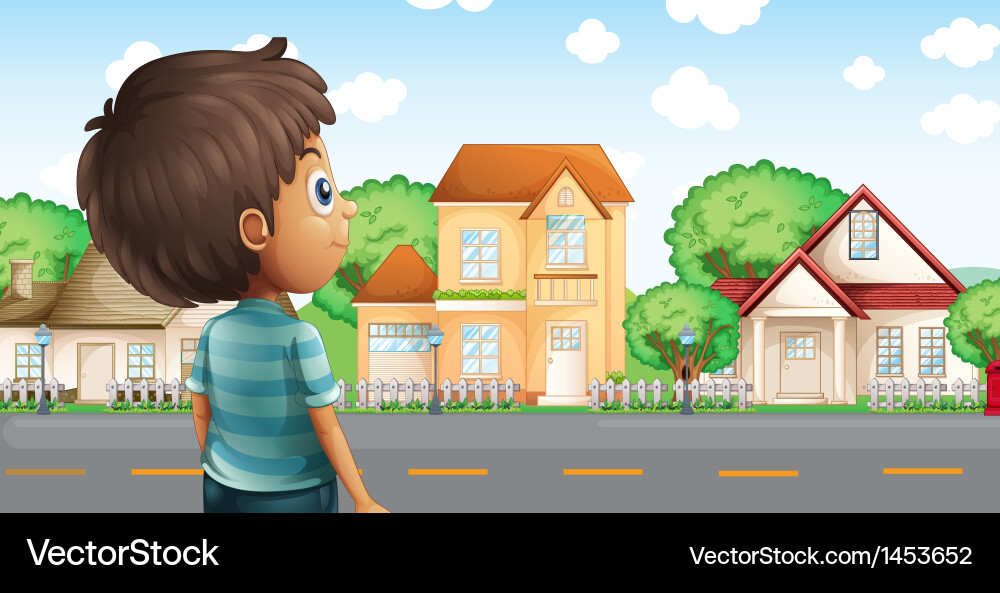 A young boy standing across village Royalty Free Vector