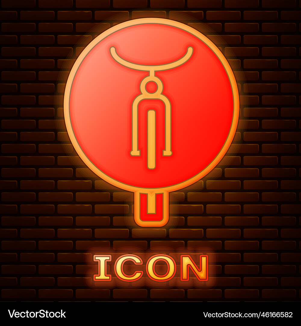 Glowing neon bicycle icon isolated on brick wall Vector Image