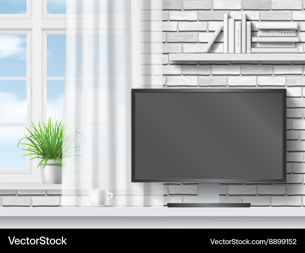 Work table with computer on white brick background