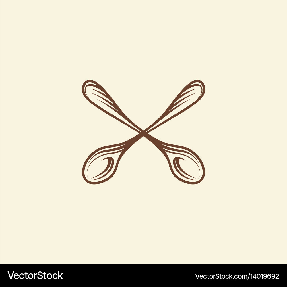 Isolated abstract brown color two tea spoons cross
