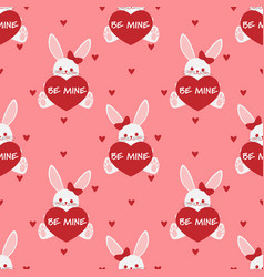 Valentines day seamless pattern with cute rabbits Vector Image