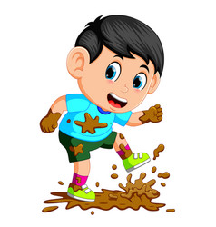 Happy boy playing in the mud Royalty Free Vector Image