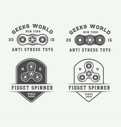 Set of vintage fidget spinners logos emblems Vector Image