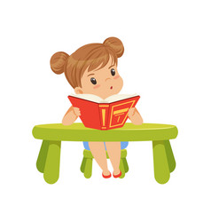 Cute girl sitting at the desk and rising her hand Vector Image