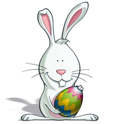 A rabbit holding an easter egg Royalty Free Vector Image
